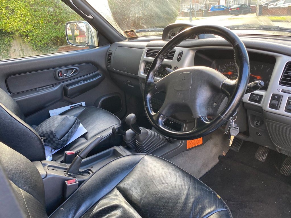 Mitsubishi L200 2002/0 - Global Int Ltd